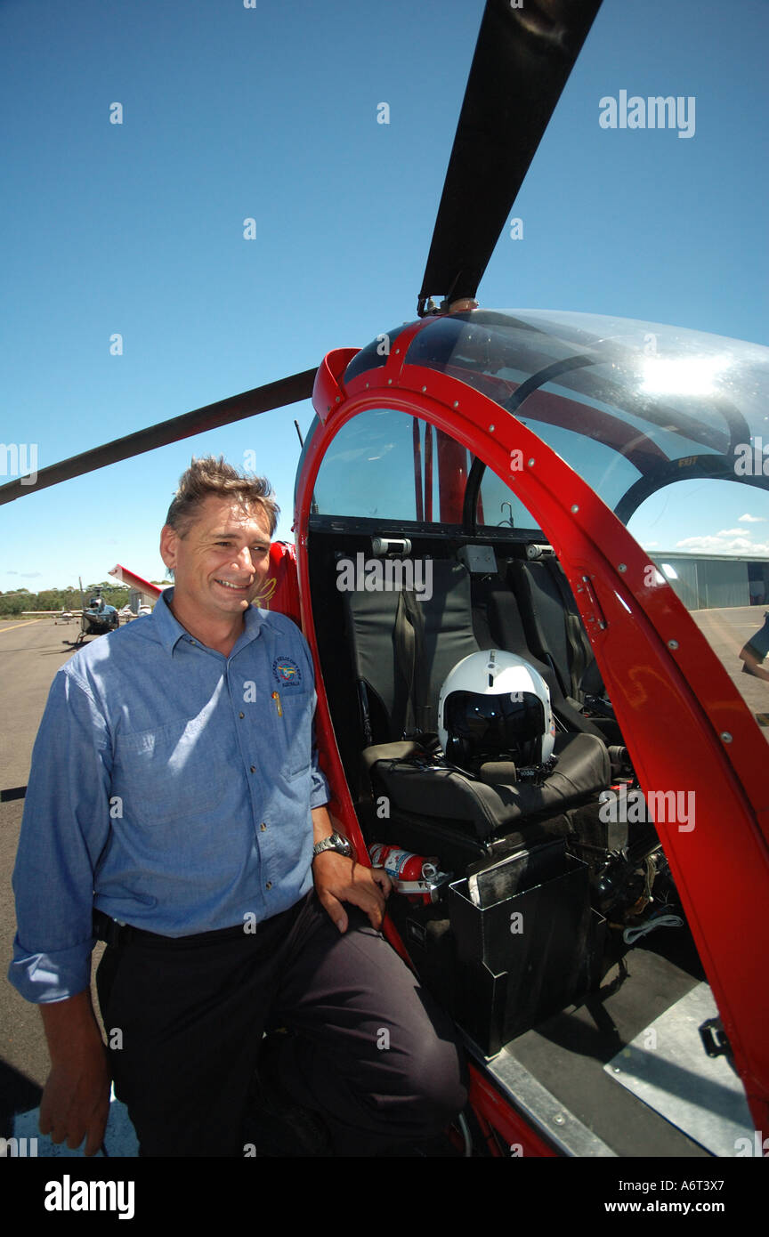 chopper pilot performing pre flight checks Stock Photo - Alamy