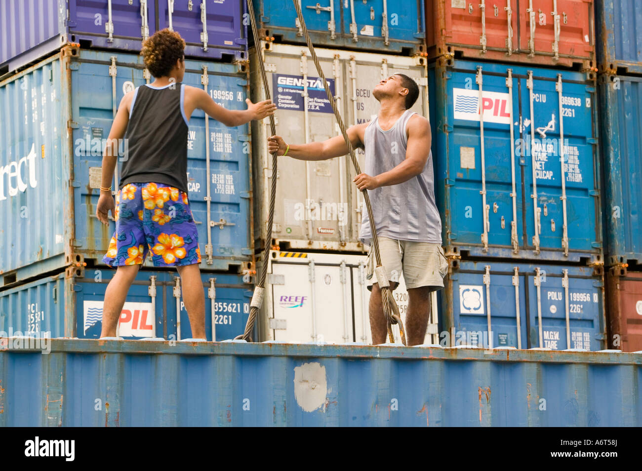 Dock workers loading ship hi-res stock photography and images - Alamy