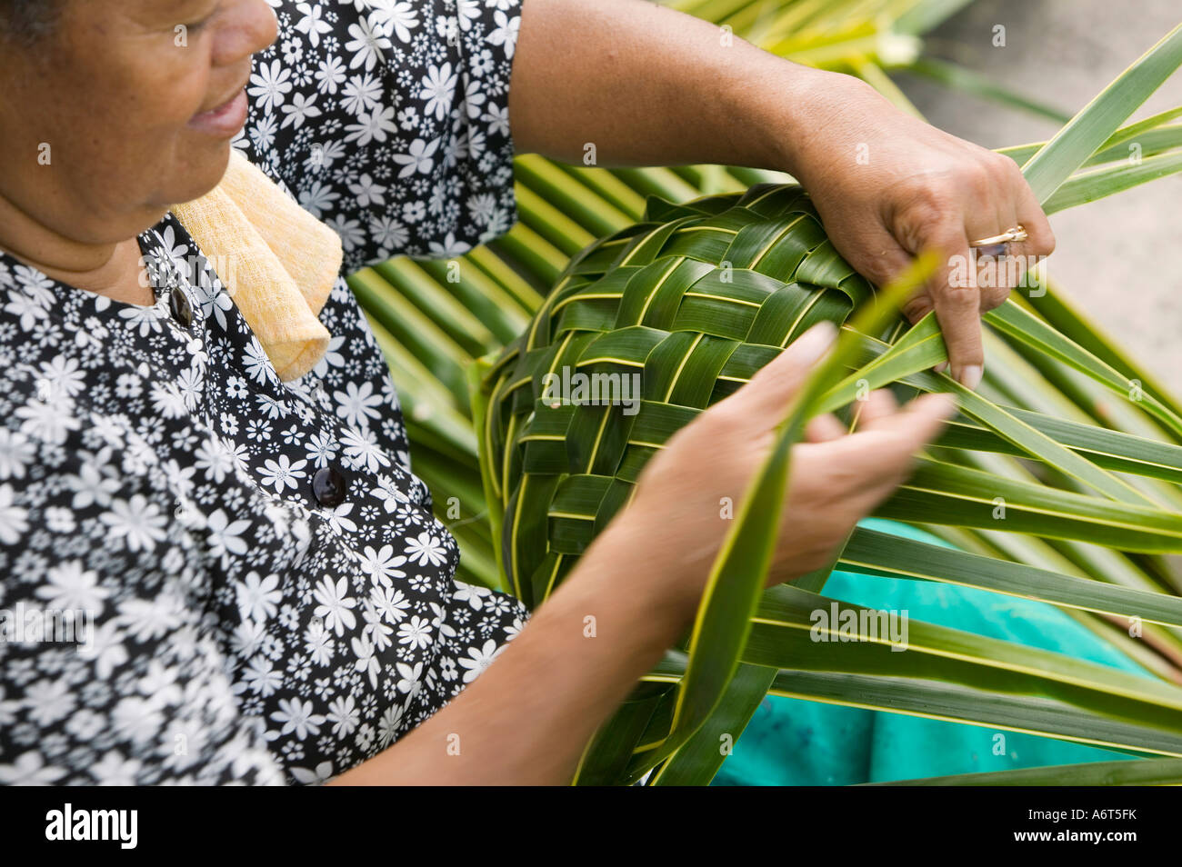 Weaving plates for food at a traditional Tuvaluan funeral feast Stock ...
