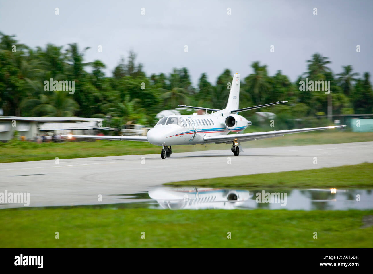 A private Japanese jet takes off from Funafuti island, Tuvalu Stock ...