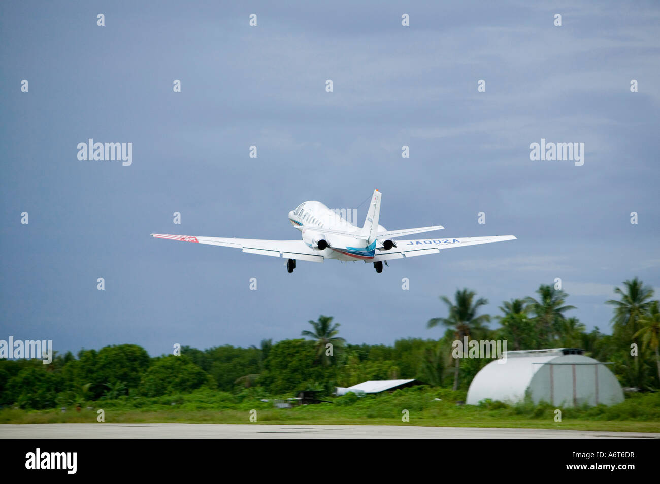A private Japanese jet takes off from Funafuti island, Tuvalu Stock ...