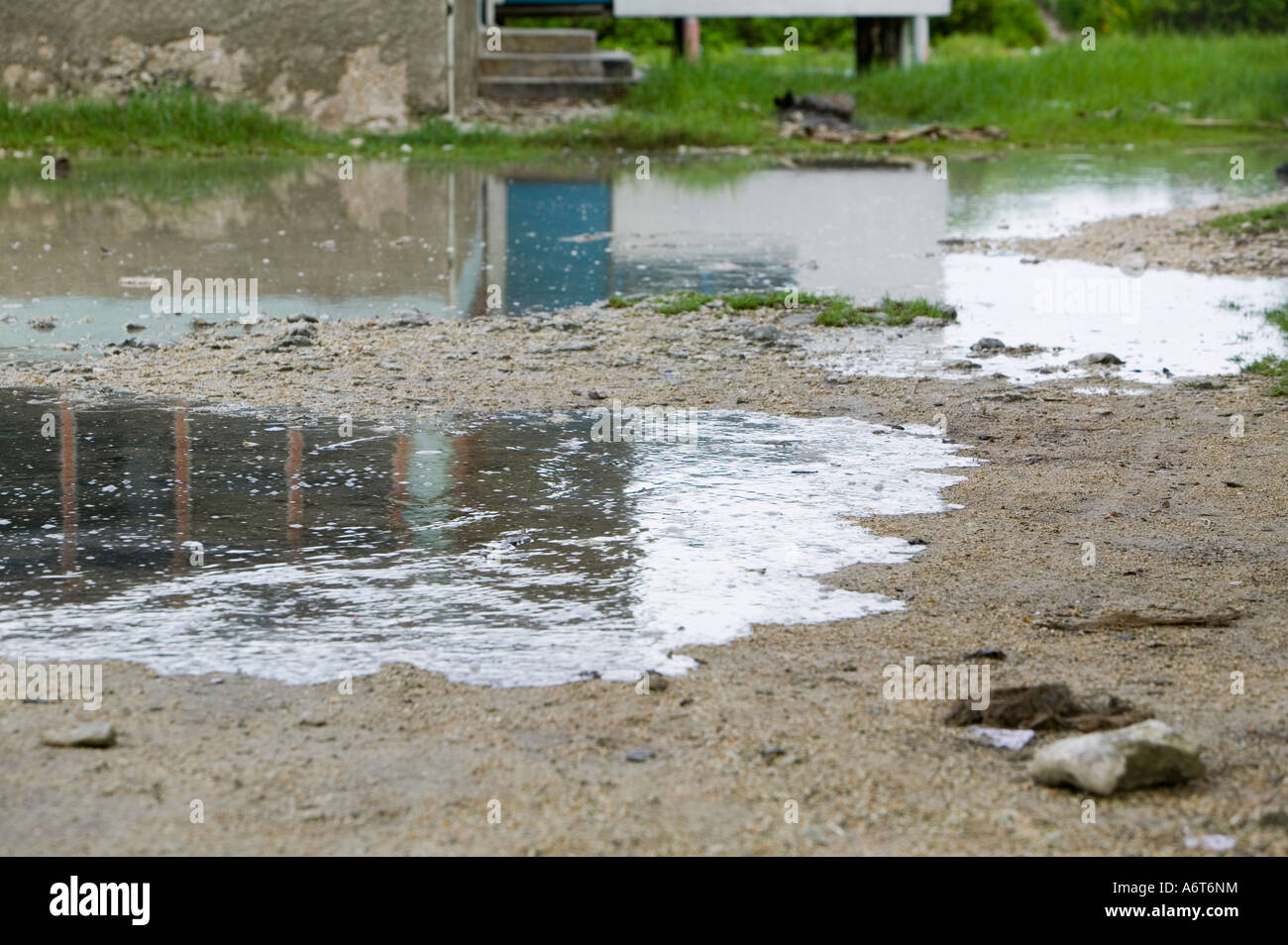 Sea water rising onto Funafuti island as it is forced up at high tide ...