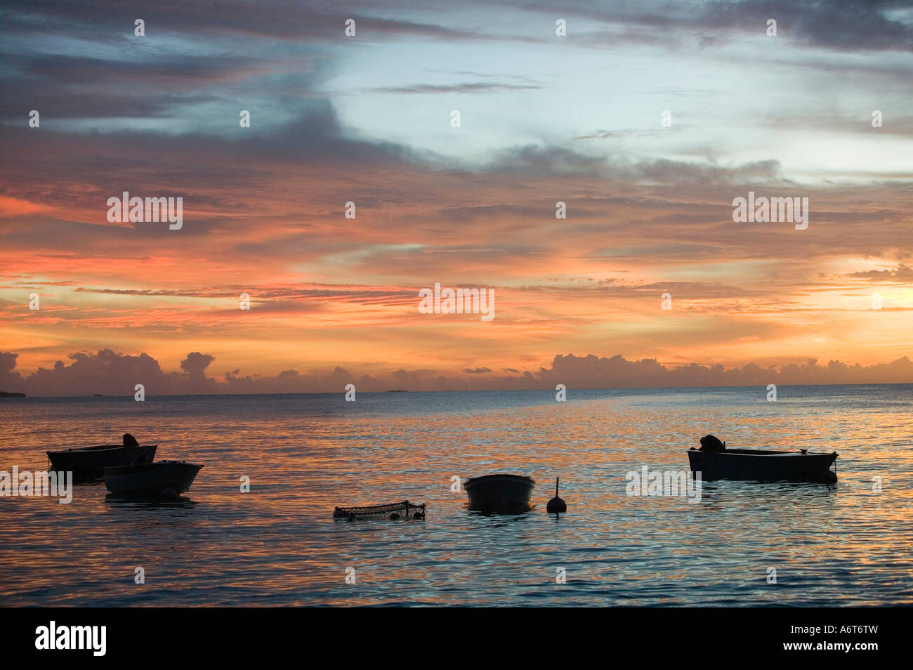 Boats at sunset on Funafuti island, Tuvalu Stock Photo - Alamy