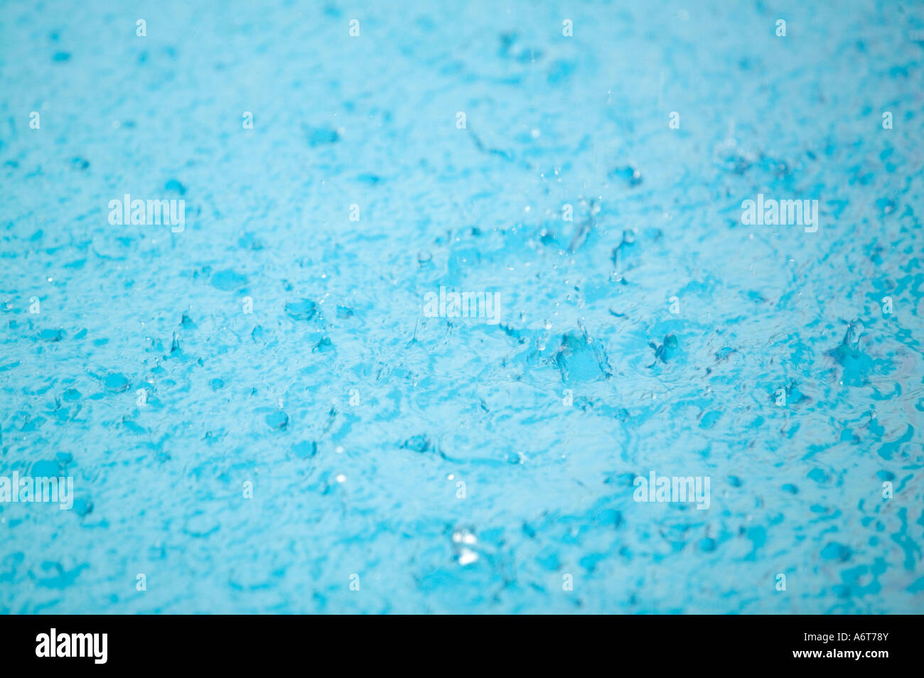 rain falling on a swimming pool in Fiji Stock Photo - Alamy