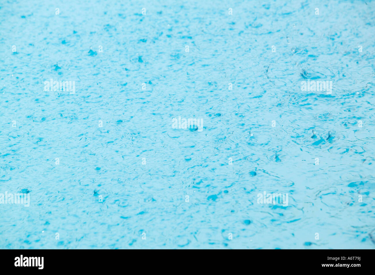 rain falling on a swimming pool in Fiji Stock Photo - Alamy