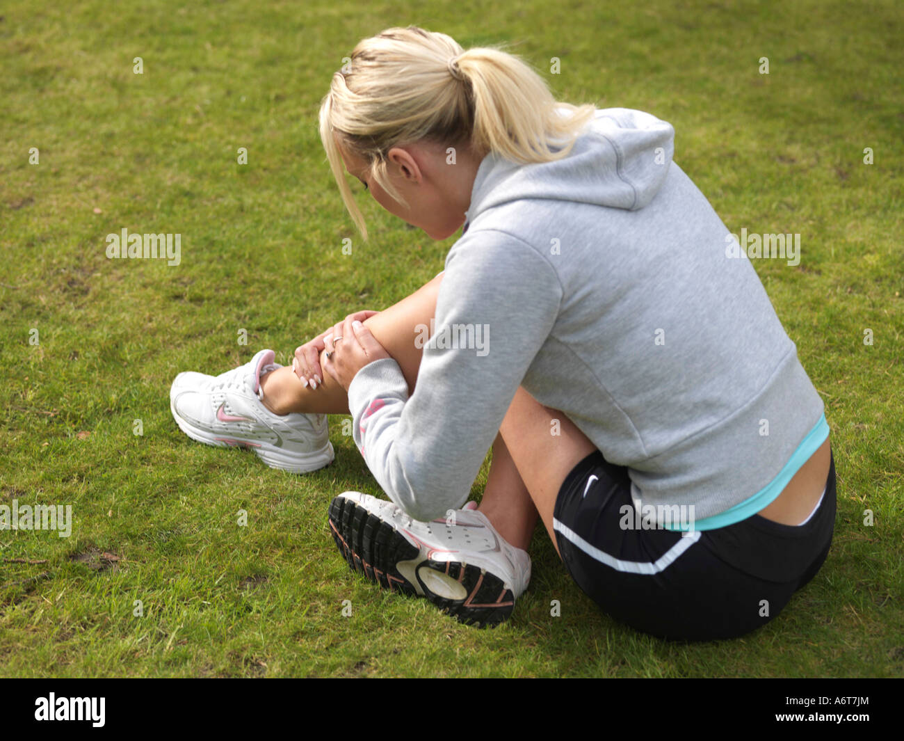 Young Woman With Cramp Model Released Stock Photo - Alamy