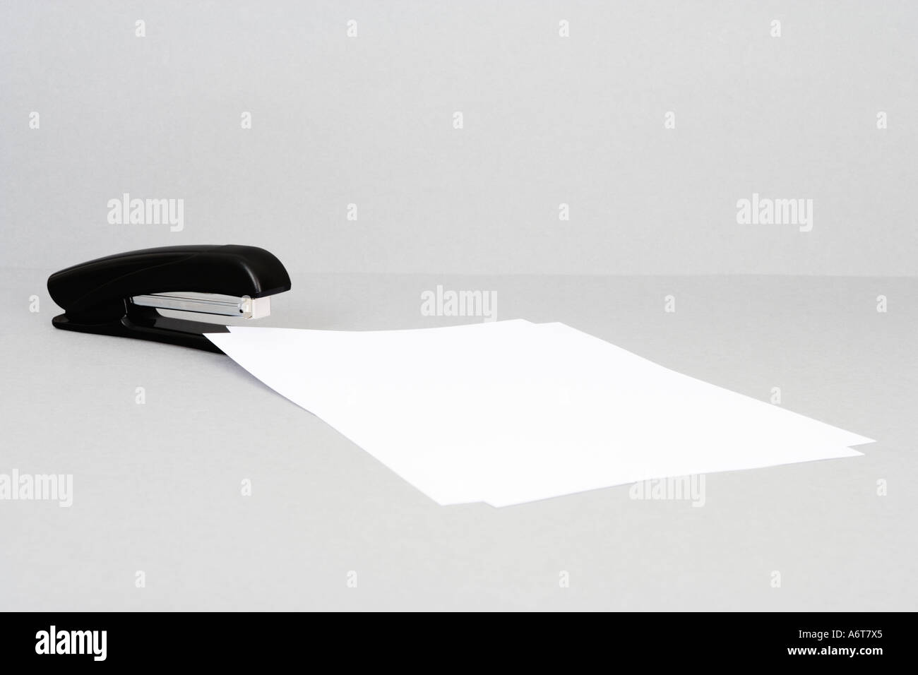 Stapler and Paper Stock Photo - Alamy