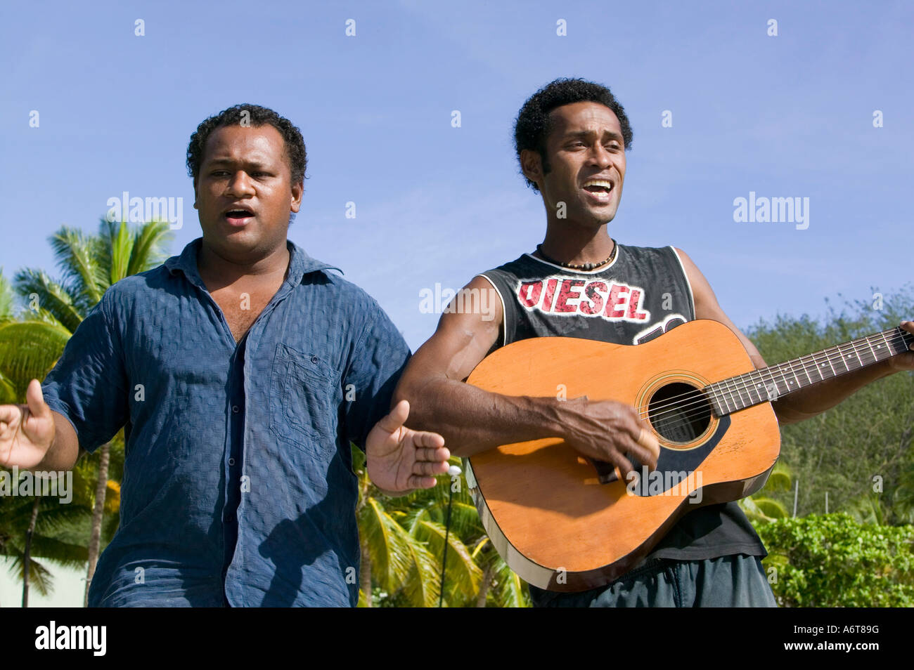 Greeting holiday makers to Walu beach resort, Malolo island, Mananucas ...