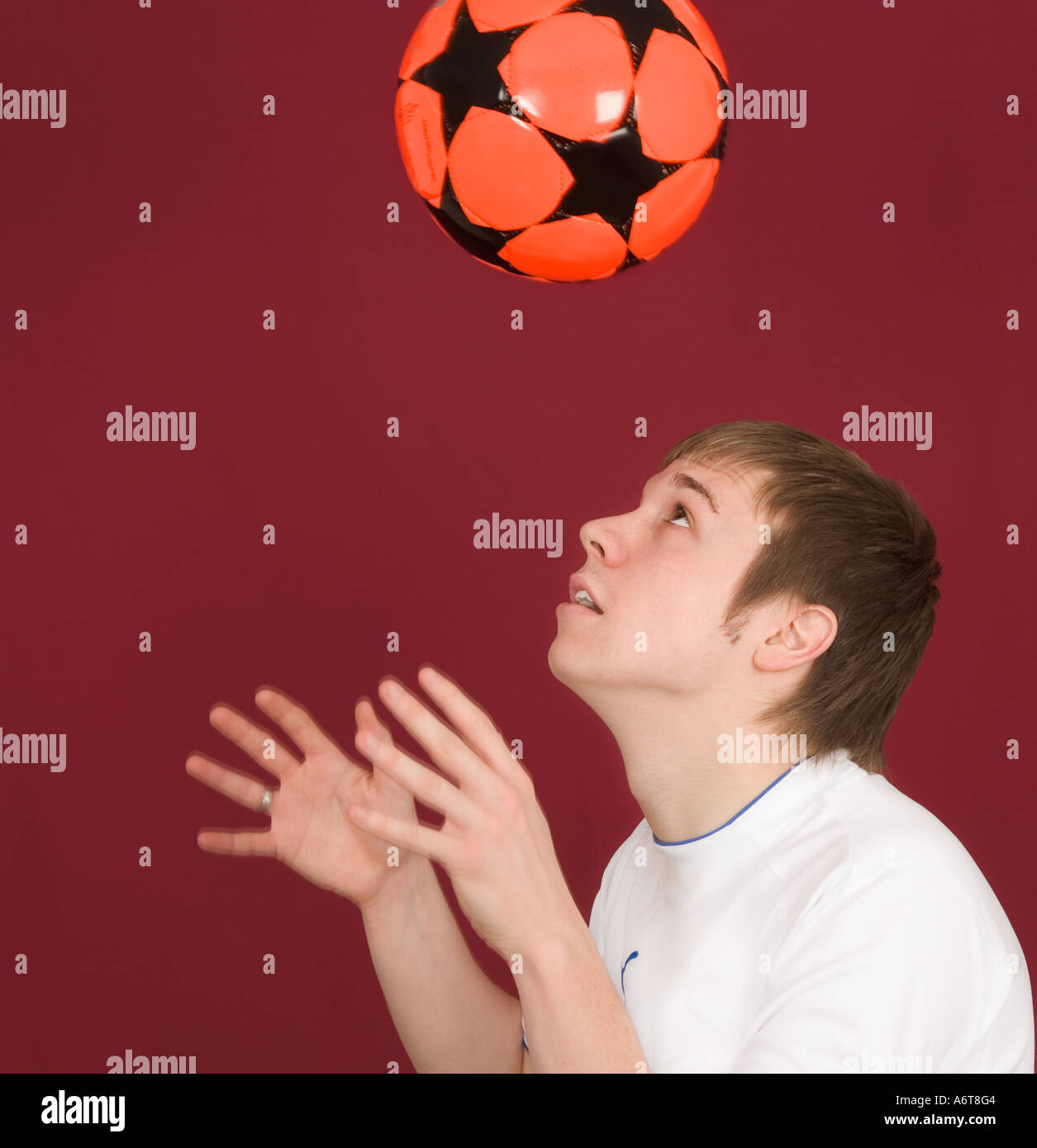 Footballer heading ball hi-res stock photography and images - Alamy