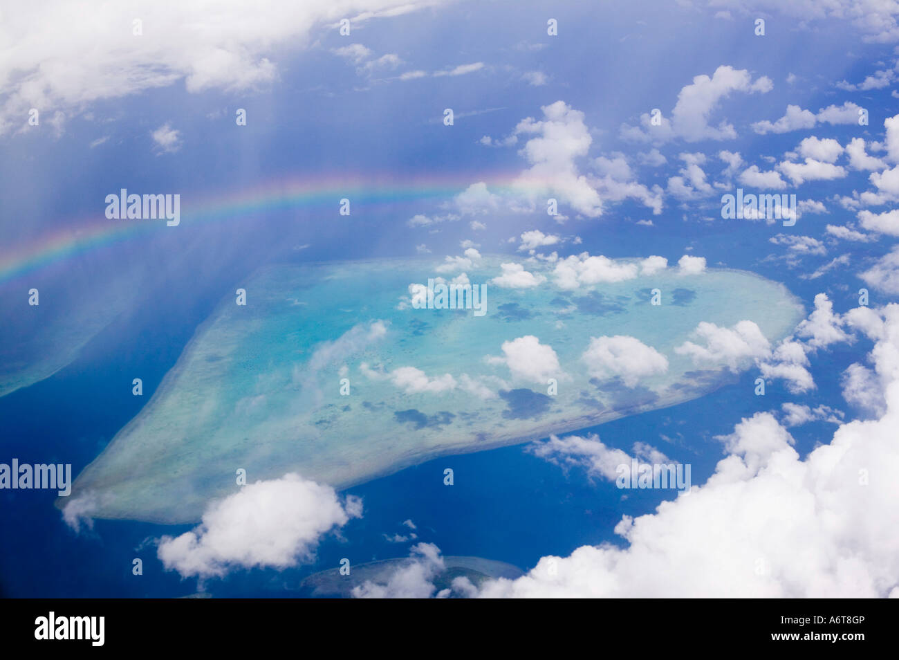 A rainbow over a coral reef near tuvalu, Pacific ocean Stock Photo - Alamy