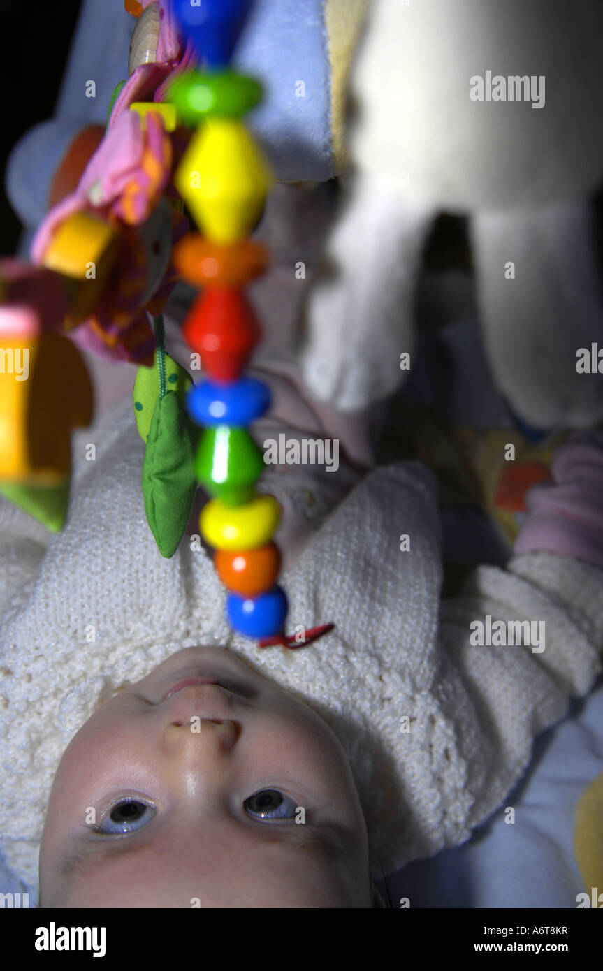 baby playgym playmat mobile toys colour color caucasian lying down ...