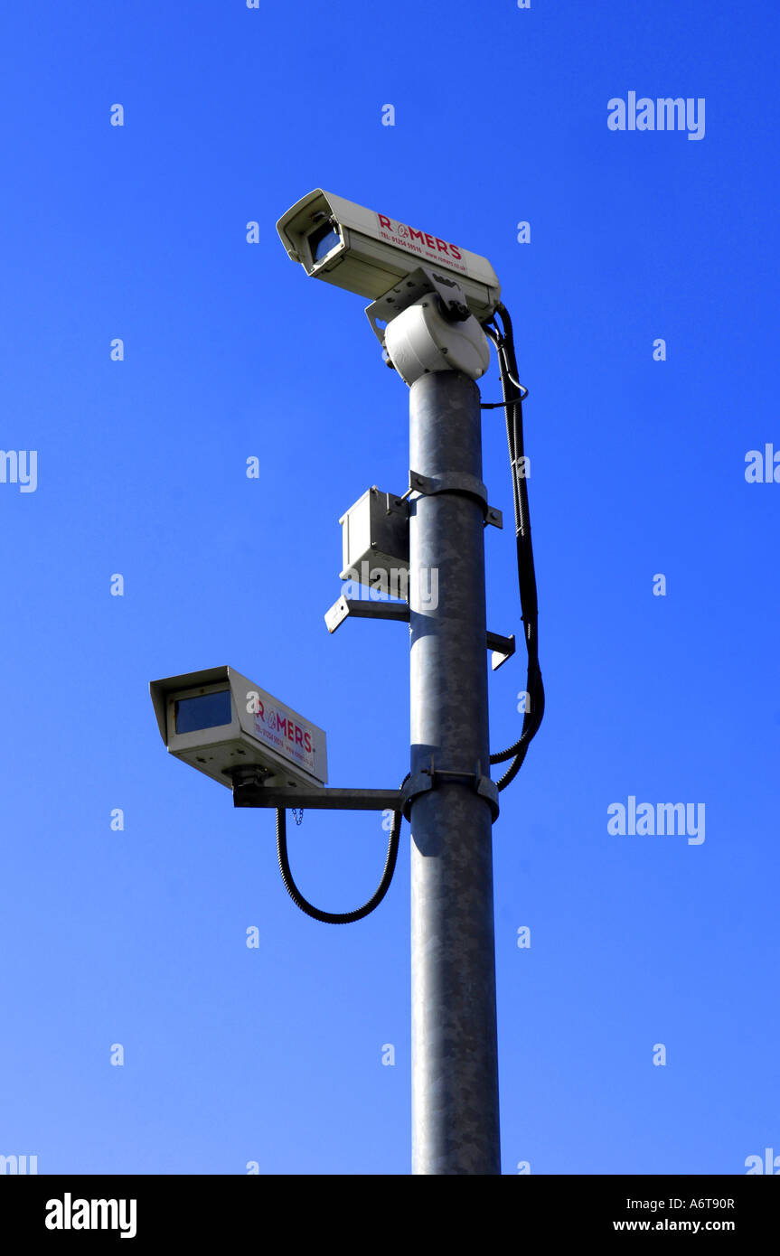 cctv cameras blue sky vertical Stock Photo - Alamy