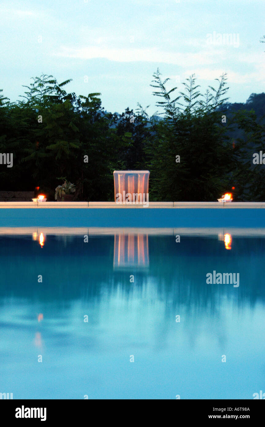 Swimming Pool and Flaming Torches Le Marche Italy Stock Photo - Alamy