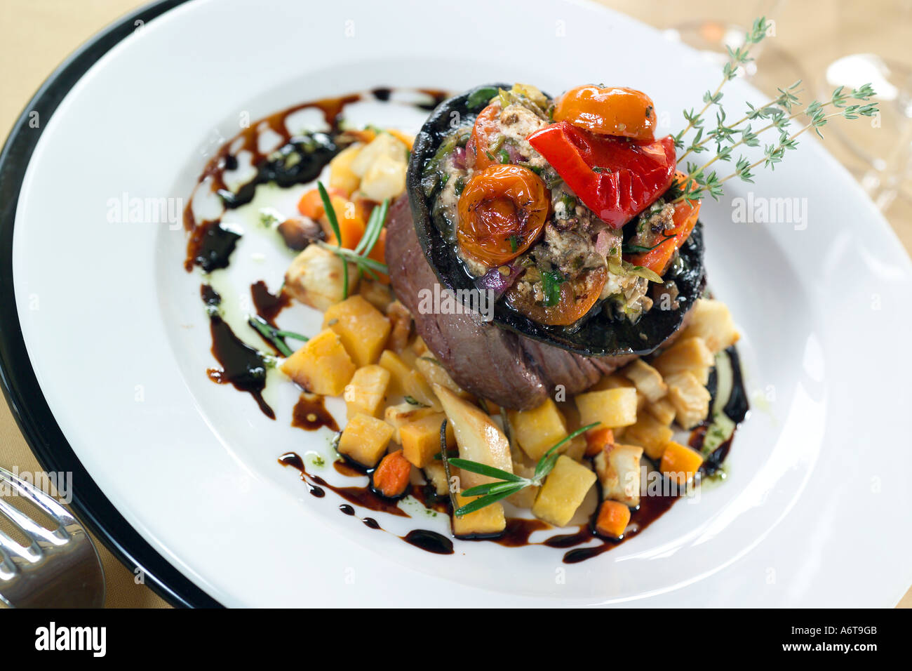Pan fried fillet Steak with seasonal roast vegetables Stock Photo - Alamy