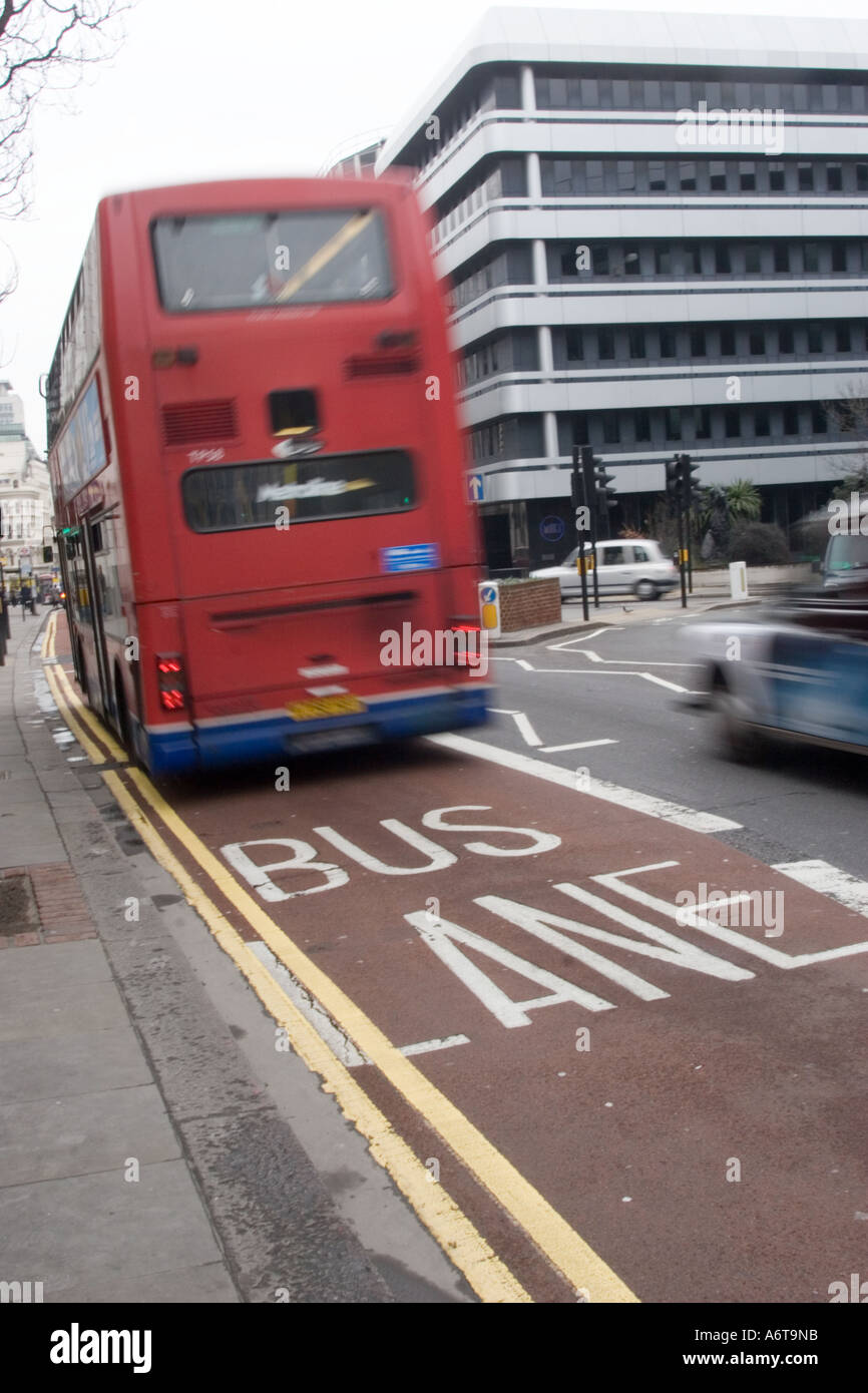 Bus lane with moving bus in the city of london hi-res stock photography ...