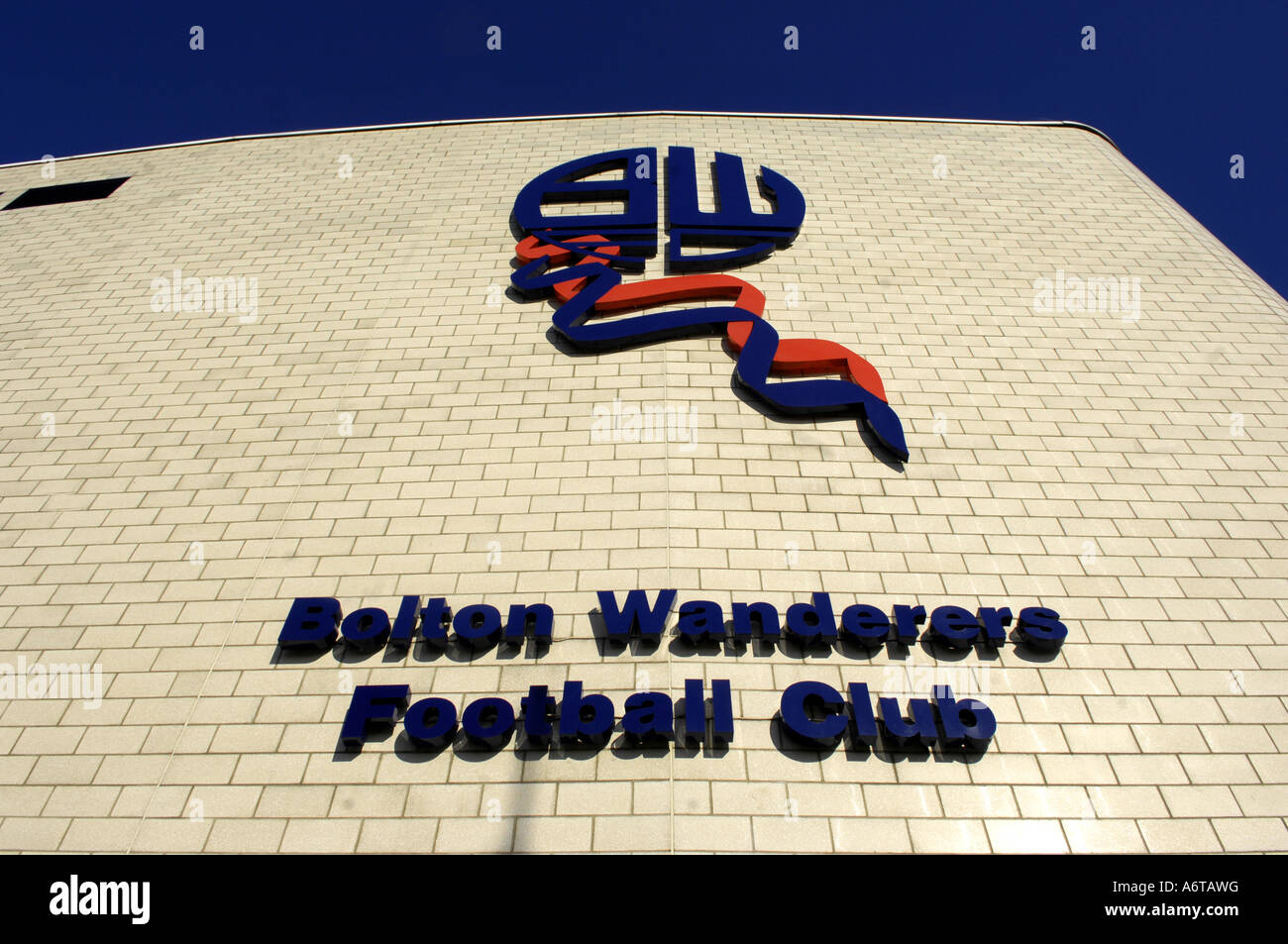 BWFC logo red blue brick wall bolton wanderers football club stadium ...
