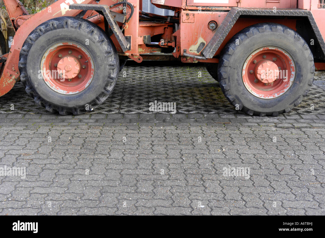red tractor wheels tyres industrial horizontal road street work ...