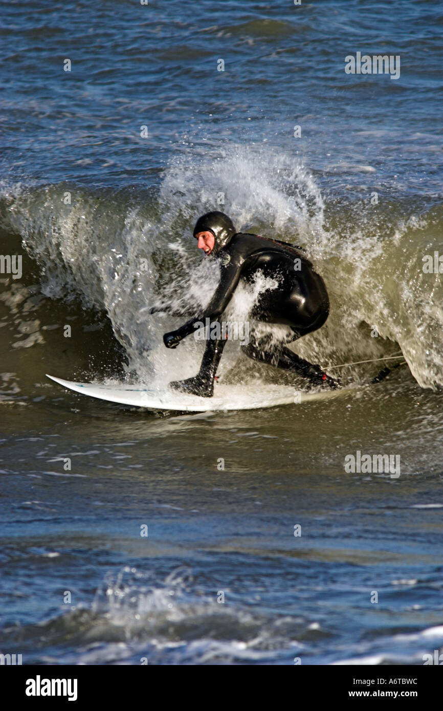 A winter surfer Stock Photo - Alamy