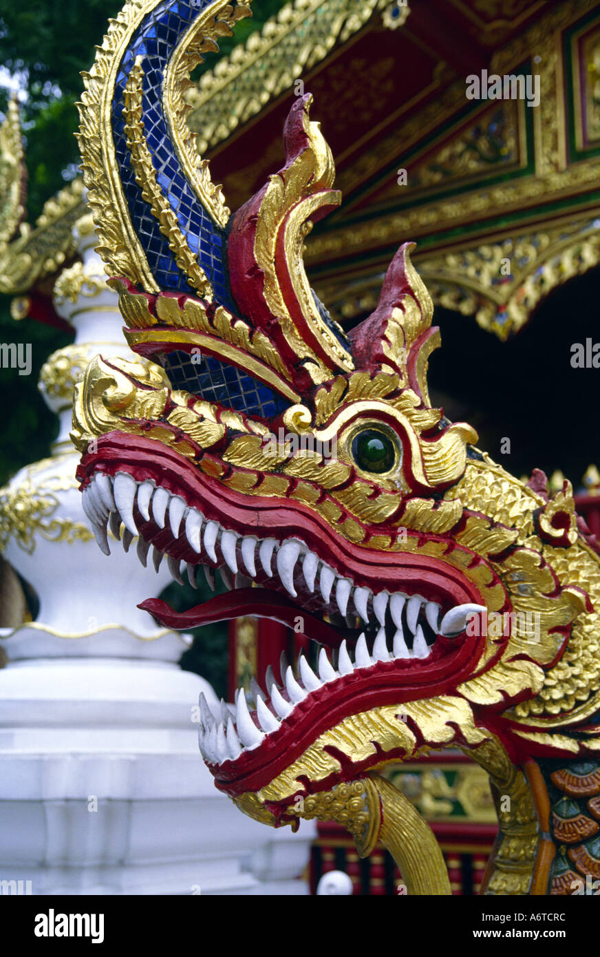 Head of a Naga; mythical beast decorating entrance to a Temple Chiang ...