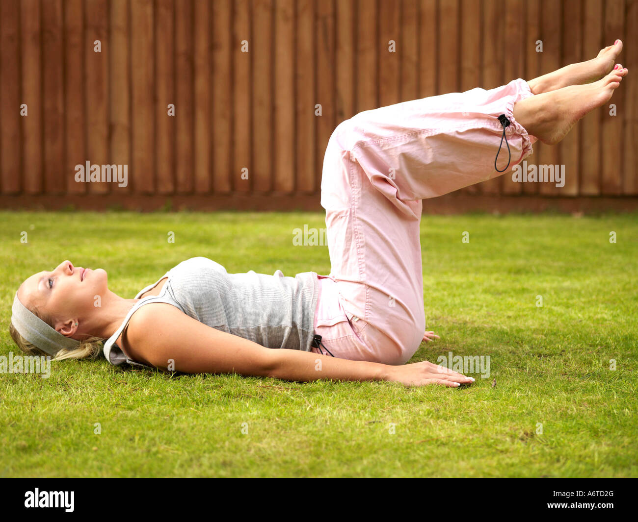 Young Woman Perfoming Pilates Exercises Model Released Stock Photo - Alamy