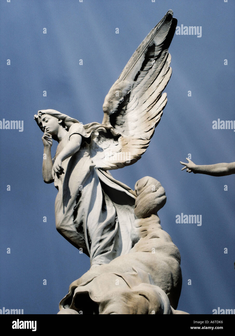 Stone angels in a cemetery Stock Photo - Alamy