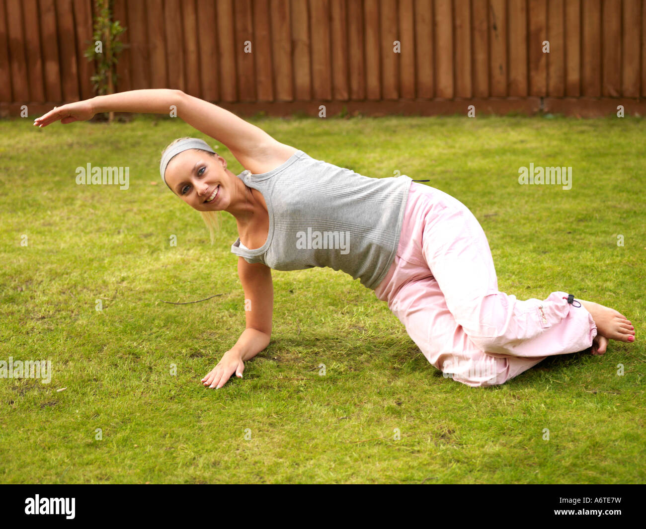 Young Woman Perfoming Pilates Exercises Model Released Stock Photo - Alamy