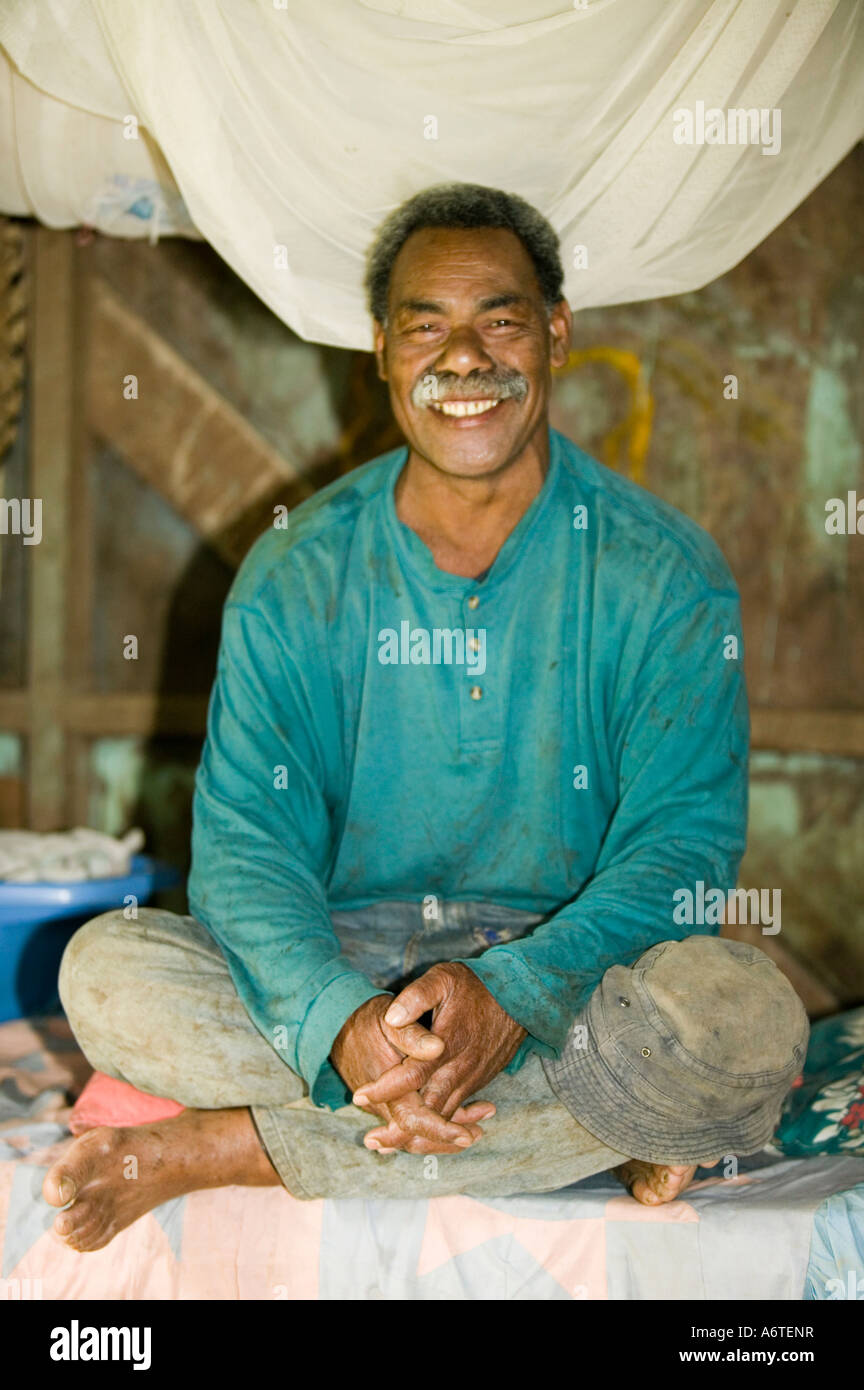A Fijian man in his hut in Bukaya village, Fiji Stock Photo - Alamy