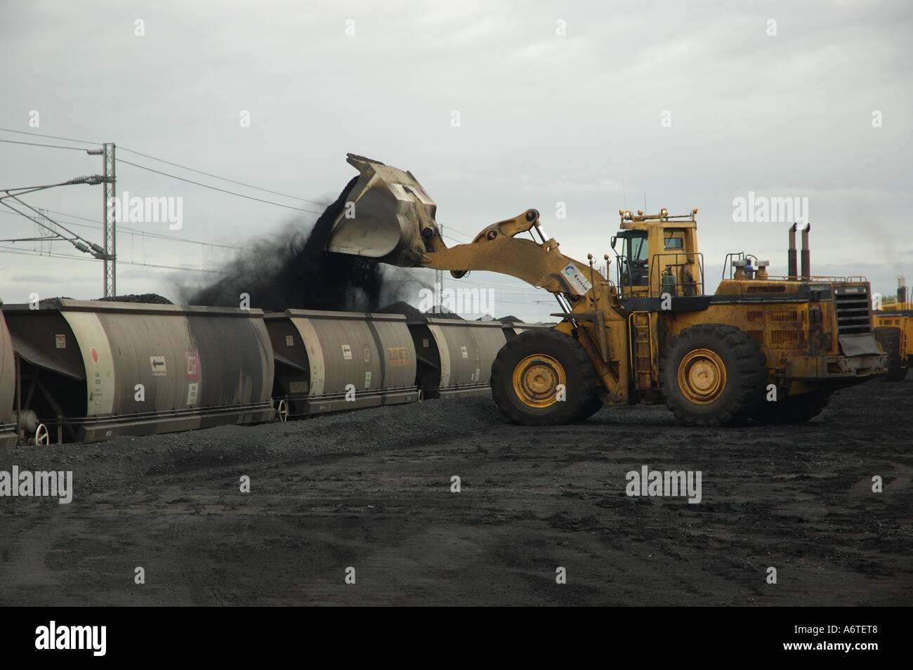 front end loader and rail wagons Central Queensland Coal Mine Stock ...