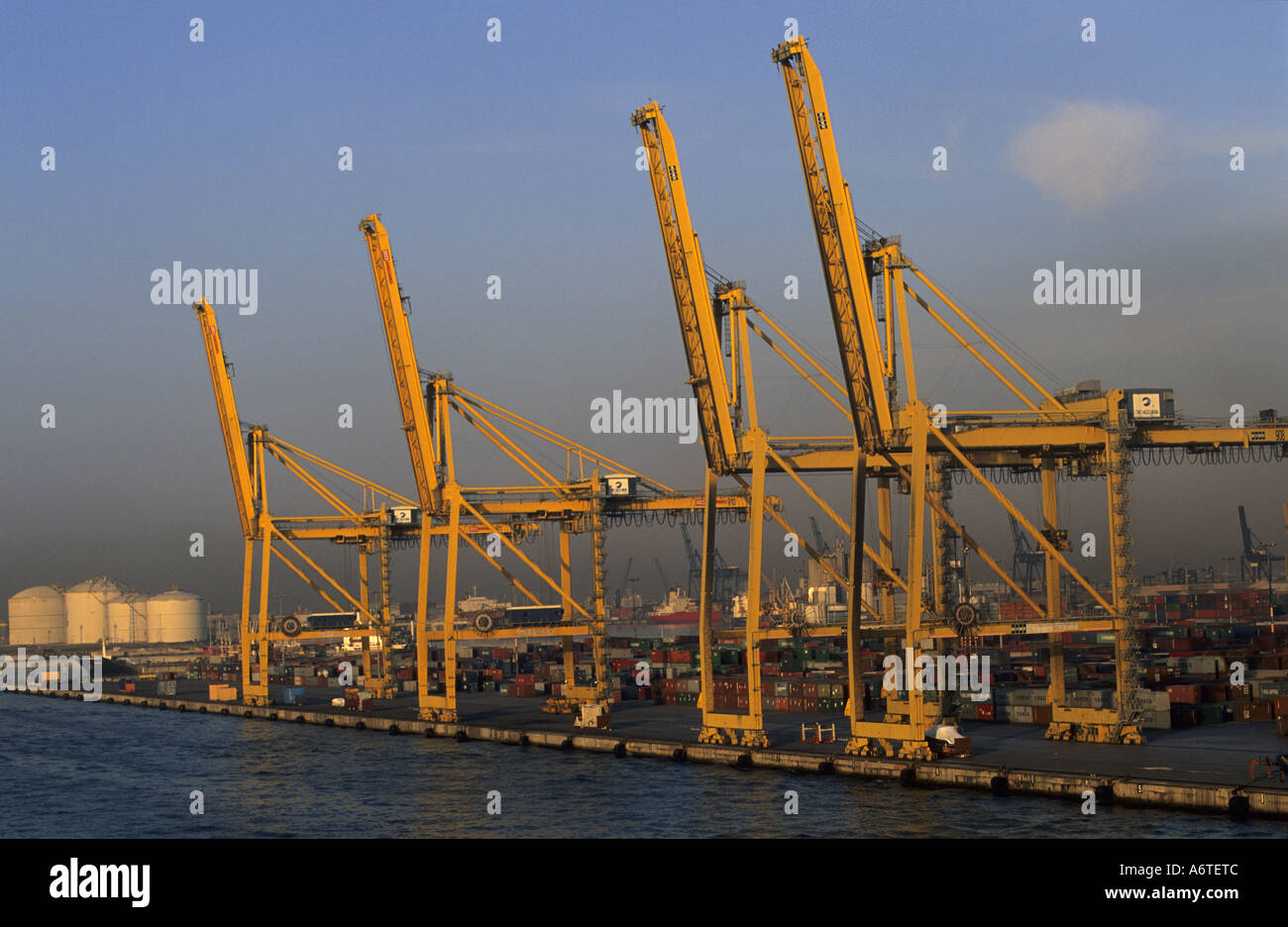 Docks and cranes at port of Barcelona Spain Stock Photo - Alamy