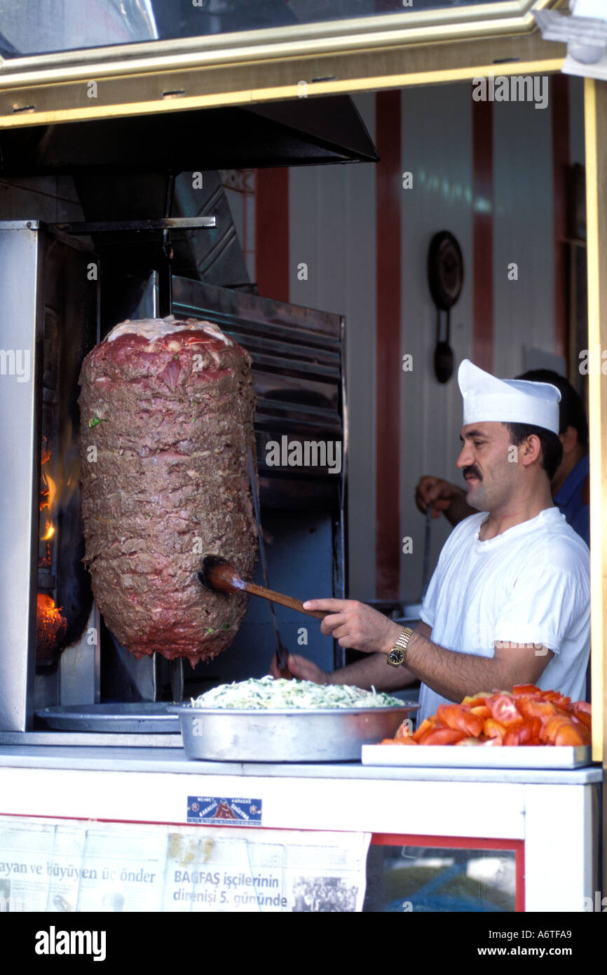 meat packed closely and cooked on a skewer Stock Photo - Alamy