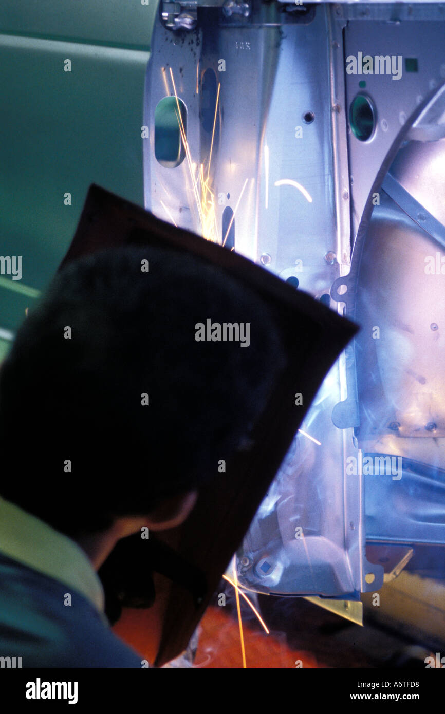 Man welding in uniform hi-res stock photography and images - Alamy