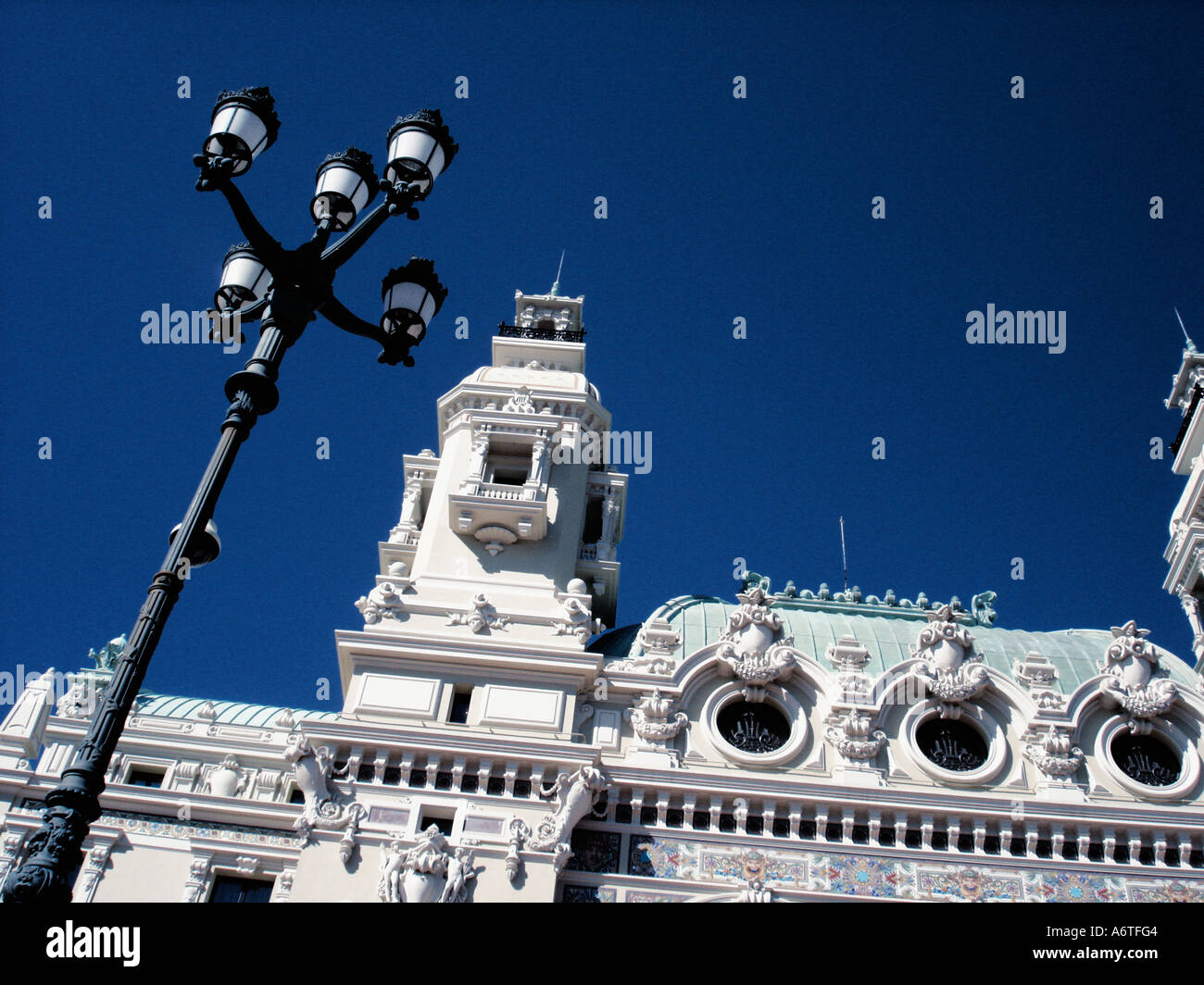 White building with street lamp in Monte Carlo, Monaco Stock Photo - Alamy