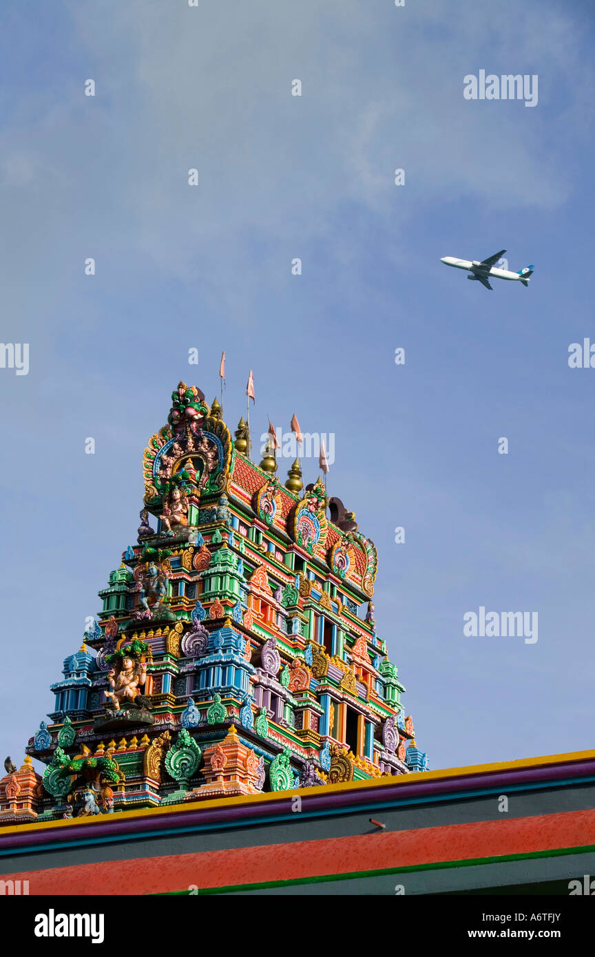 A plane flying over the Sri Siva Subramaniya Swami Temple, a Hindu ...