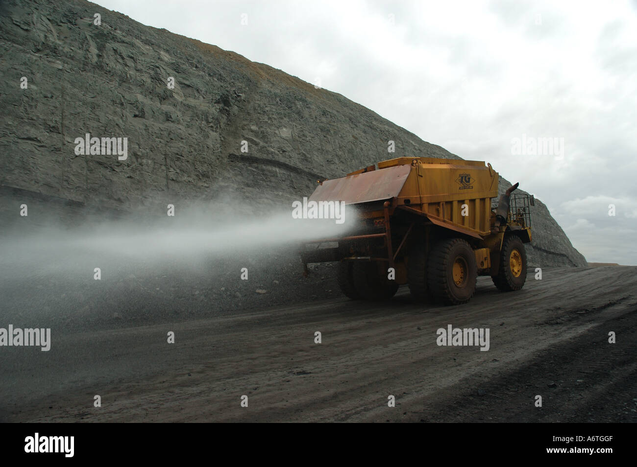 Water tanker in open cut coal mine Queensland Australia Stock Photo - Alamy