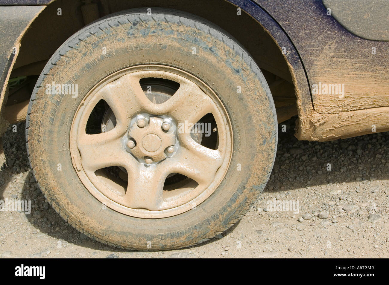 A muddy car wheel Stock Photo - Alamy