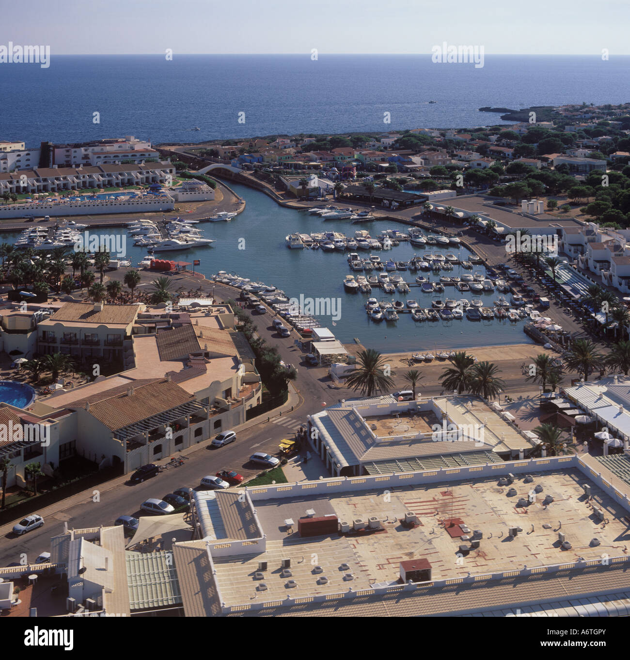 Aerial view - looking Southwards over the marina and resort at Cala en ...