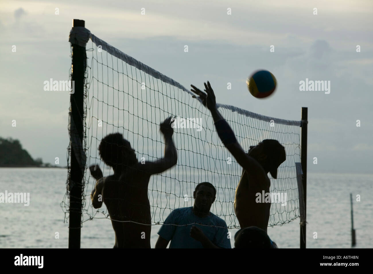 Fijians playing beach volleyball at Walu Beach resort on Malolo Island ...