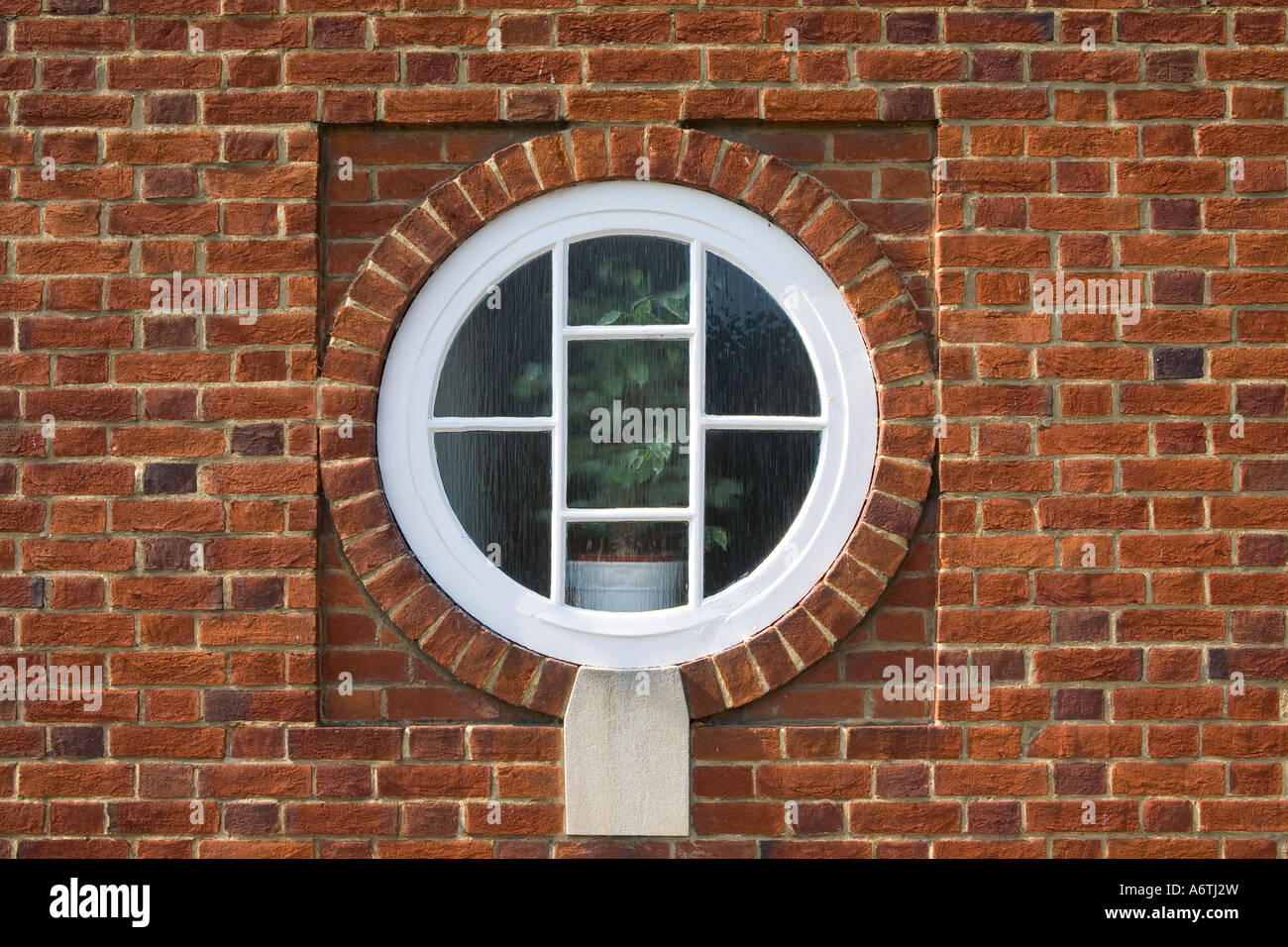 Circular window in Salisbury with an ornamental brick surround Stock ...