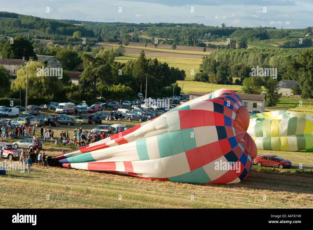inflating a hot air balloon by heating up the air inside. annual ...