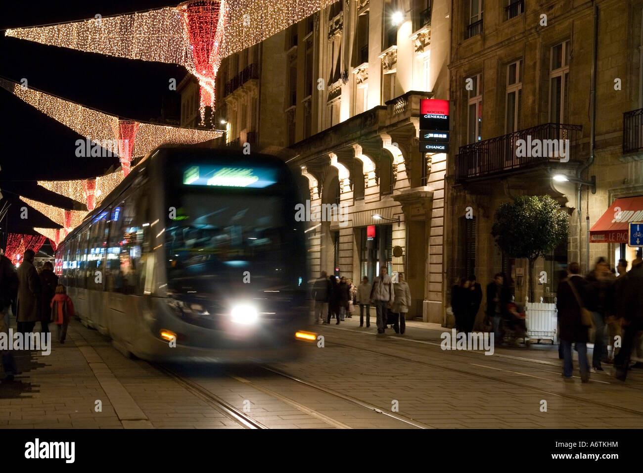 Tram passing under the Christmas decorations Cours de l intendance ...