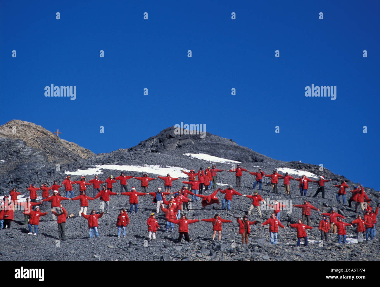 Antarctica, Ross Island, McMurdo Station residents form a peace sign ...