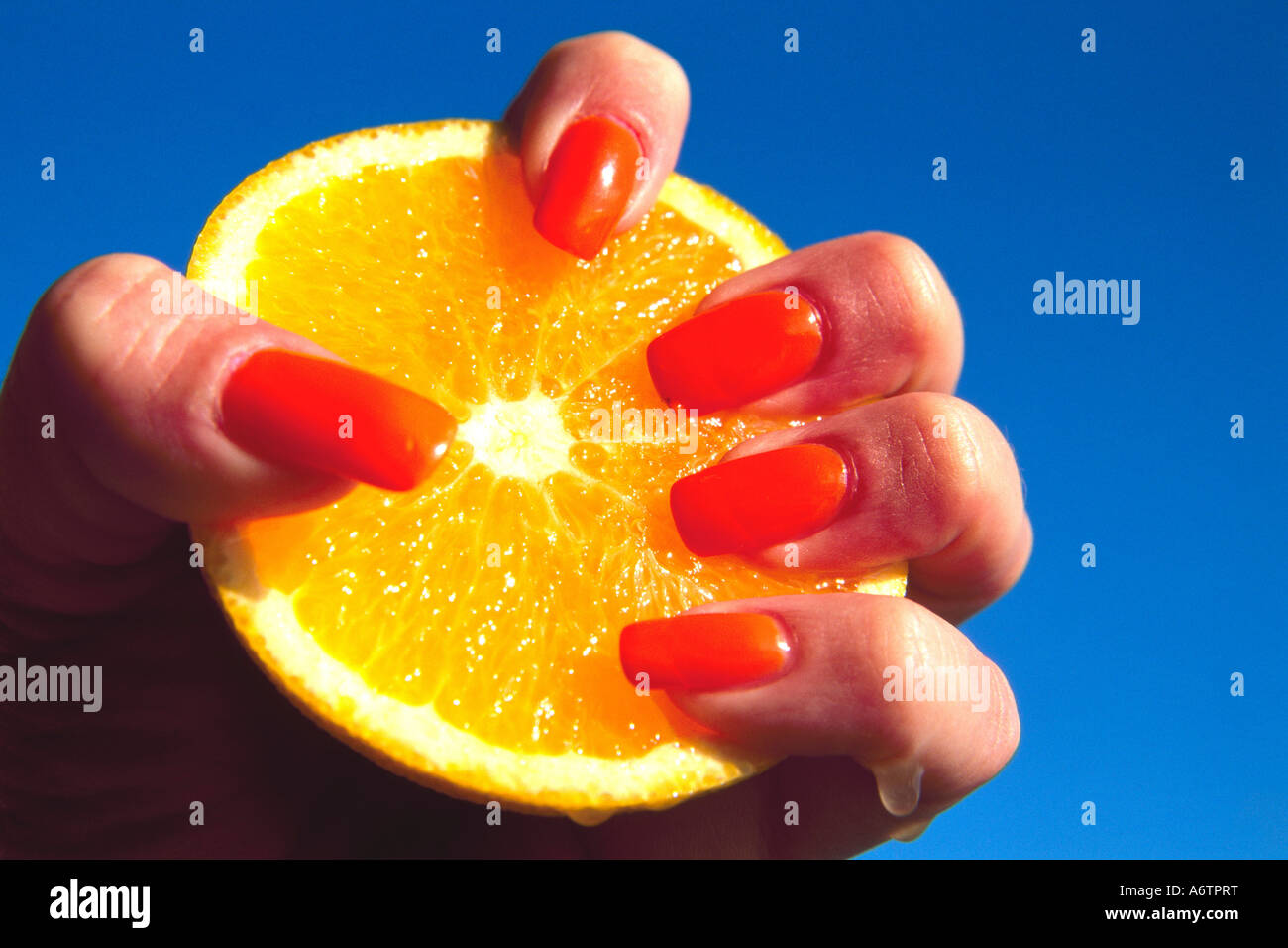 Hand crushing fruit hi-res stock photography and images - Alamy