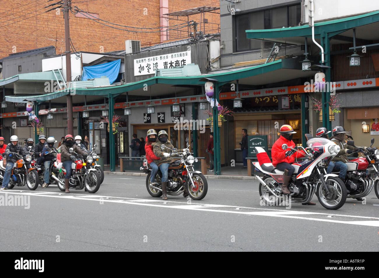 Japan central Honshu Kansai Kyoto group of youngsters riding together ...
