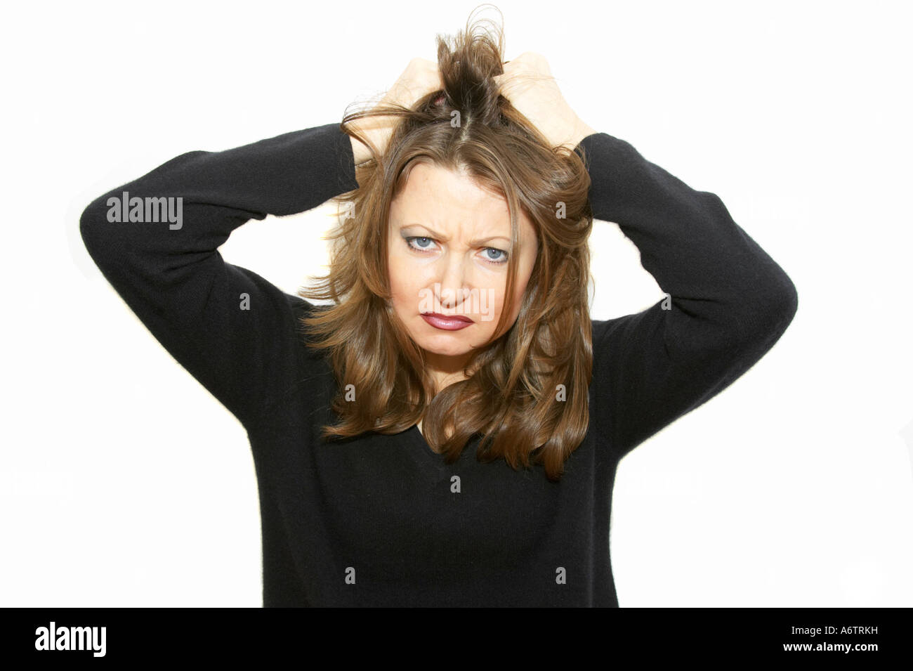Young Woman Pulling Hair Out Stock Photo - Alamy