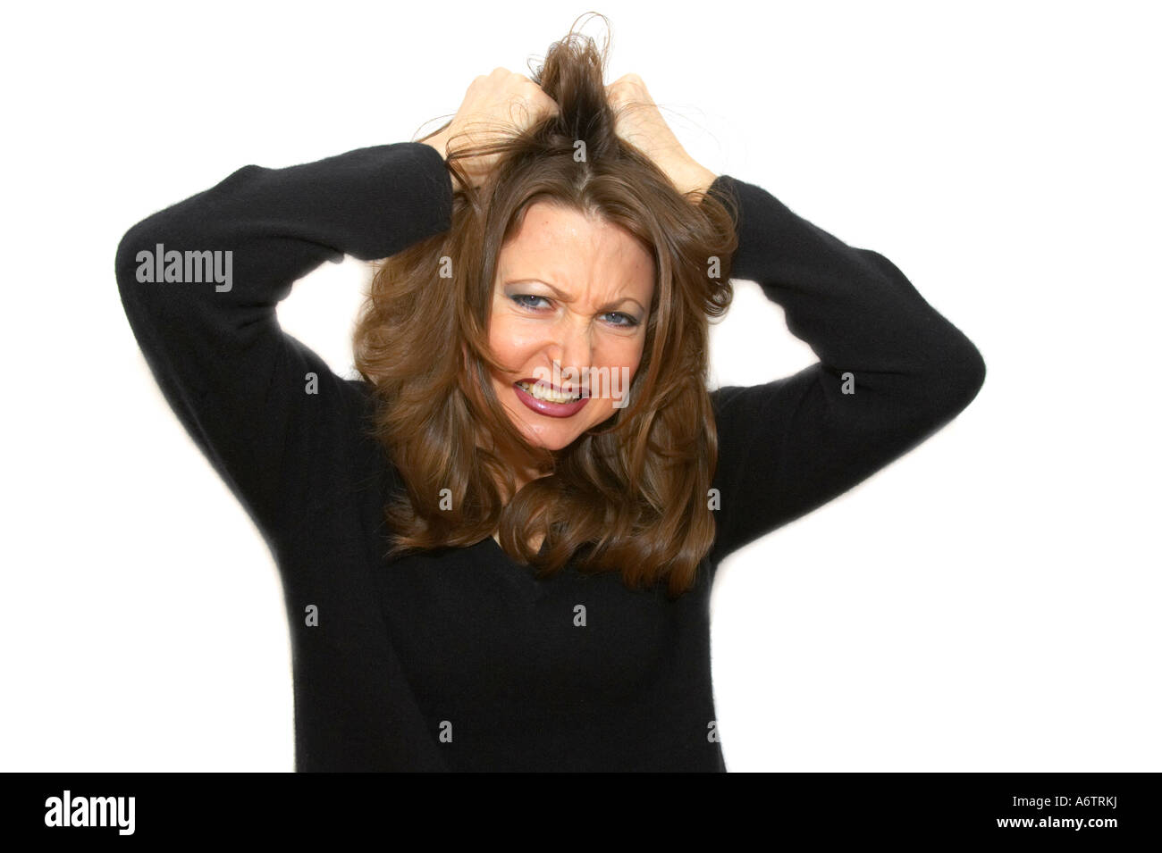 Young Woman Pulling Hair Out Stock Photo - Alamy