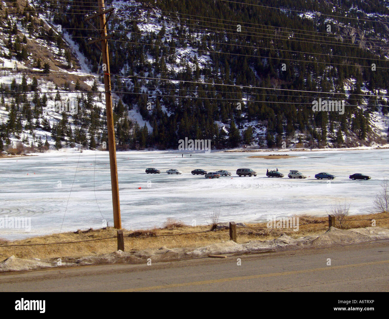 cars driving on a frozen lake. Colorado. USA Stock Photo - Alamy