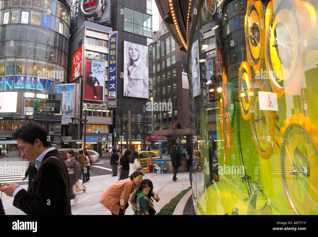 Japan Honshu Tokyo Ginza People looking at department store shop window ...
