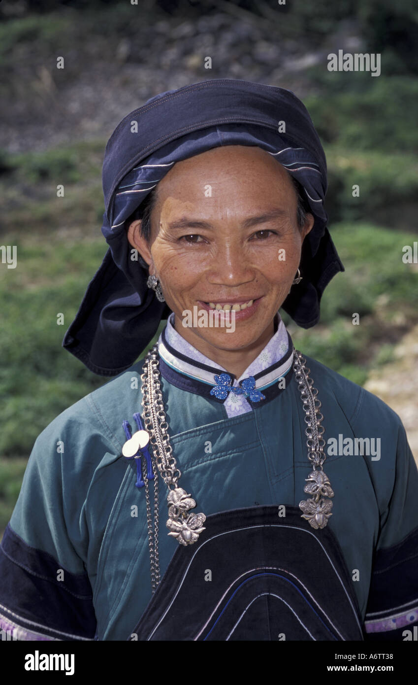 China, Yunnan Province. Bouyei minority woman in traditional costume ...