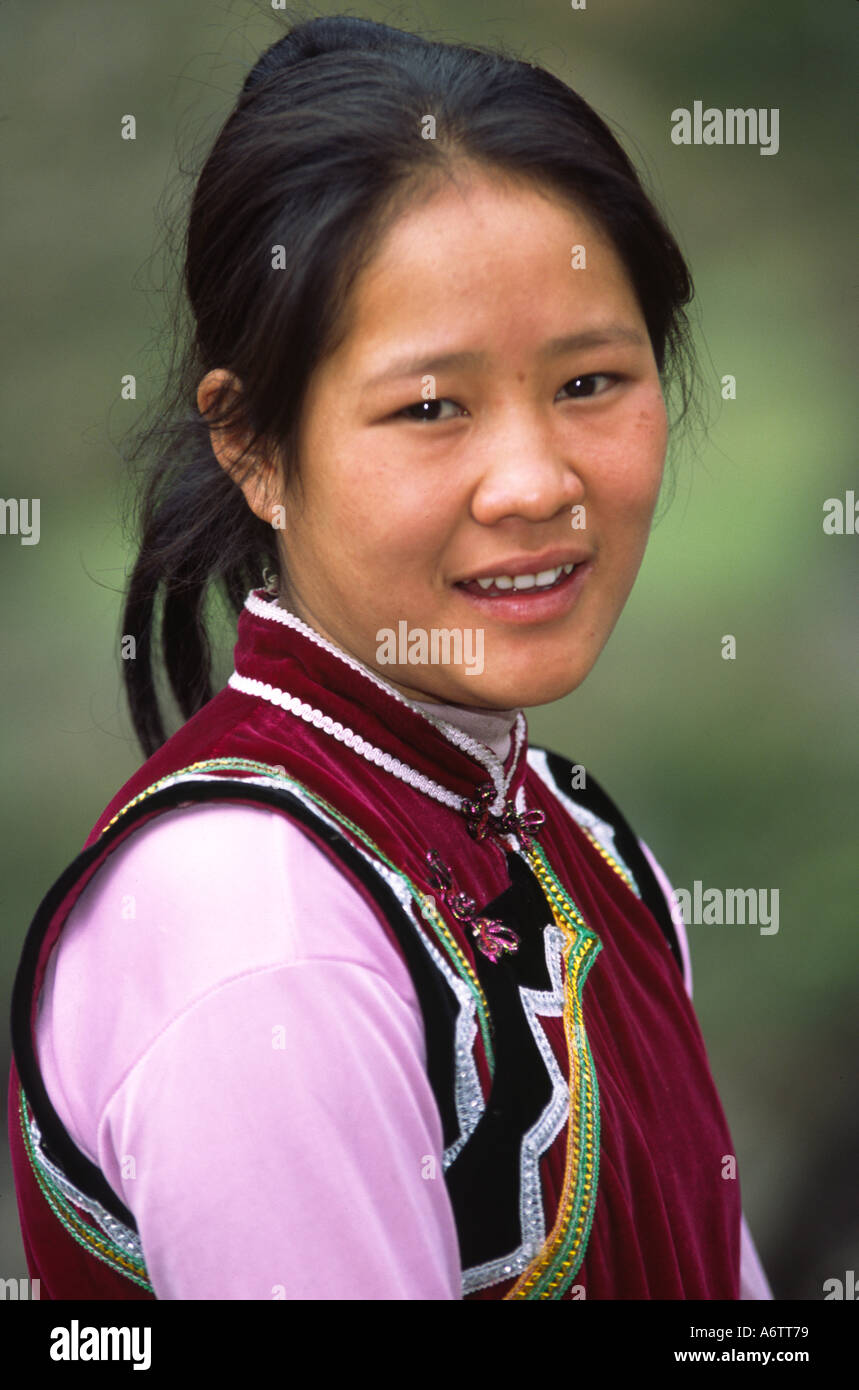 China, Yunnan, Nujiang Prefecture. Young Nu woman in traditional ...