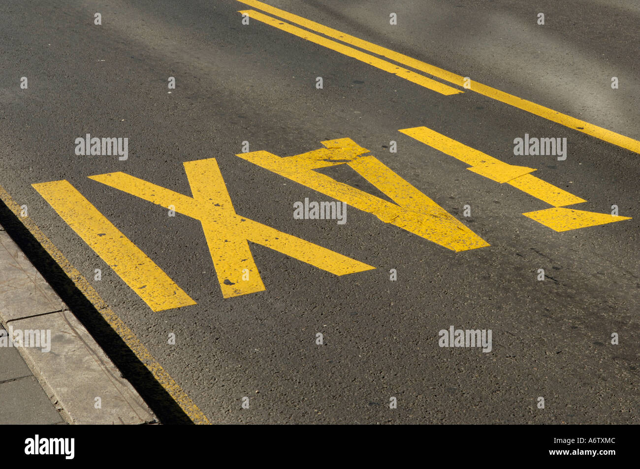yellow taxi marking on the street Stock Photo - Alamy